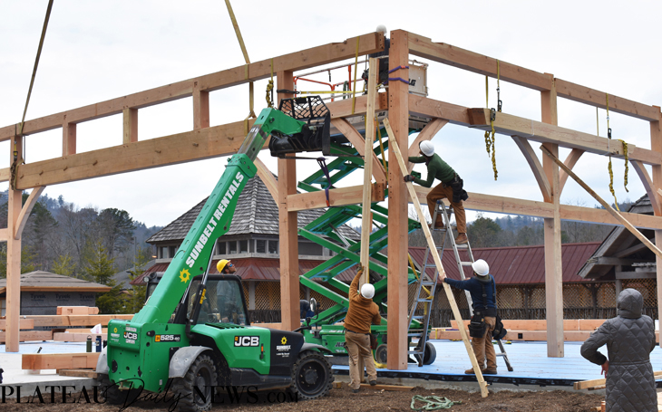 Timber frame raised for new Commons building at The Village Green ...