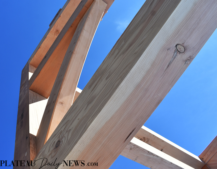 Timber frame raised for new Commons building at The Village Green ...